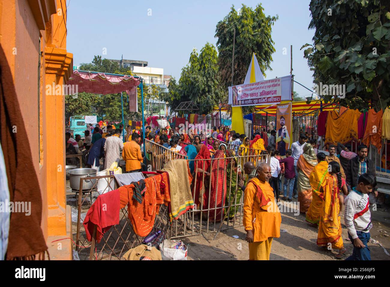 Pilgrims line up for the free food called Bhandara on the Bibaha ...