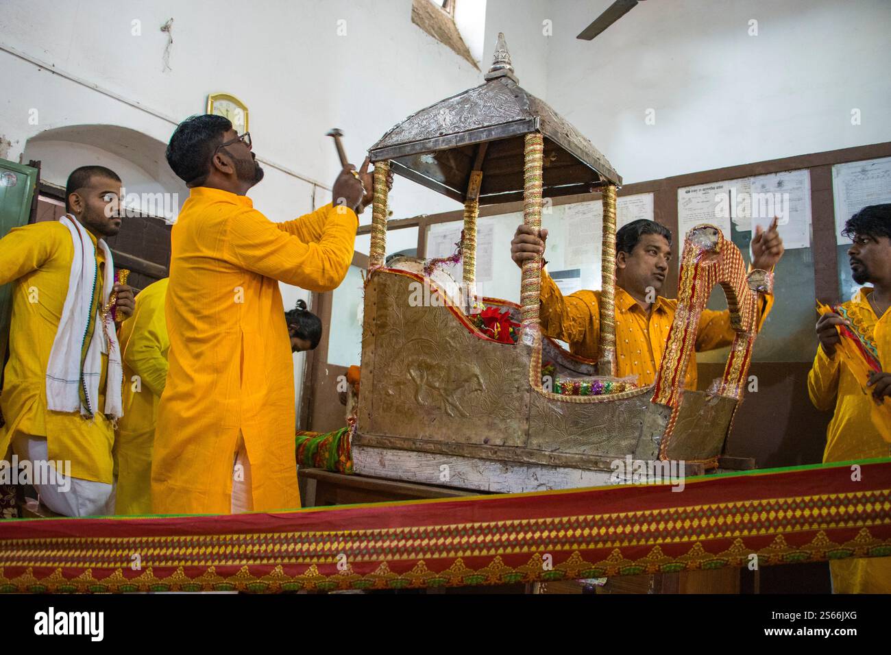 Volunteers of Ram Yuva Committee decorating Ram Dola (palanquin) for ...