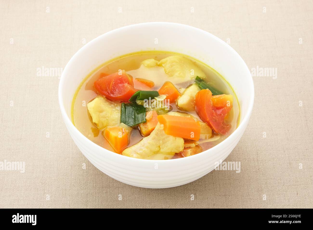 Dori Kuah Kuning, fish soup with carrot, tomatoes and leeks. Indonesian ...