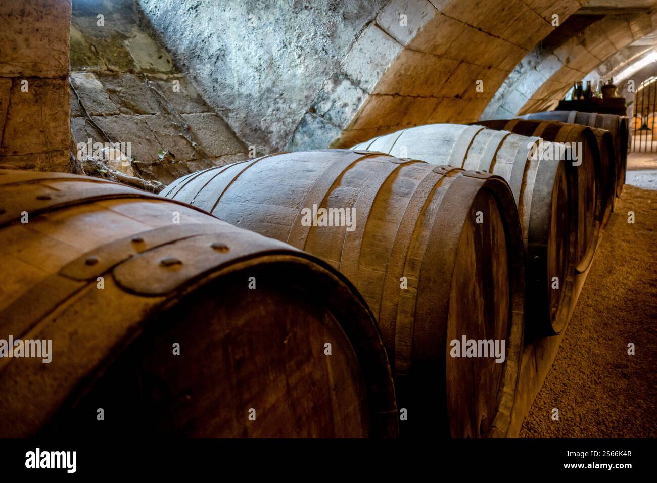 Old wood barrels in a rustic wine cellar. Barrels in a rustic wine ...