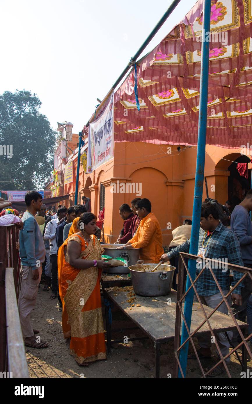 Pilgrims line up for the free food, Bhandara on the Bibaha Panchami day ...