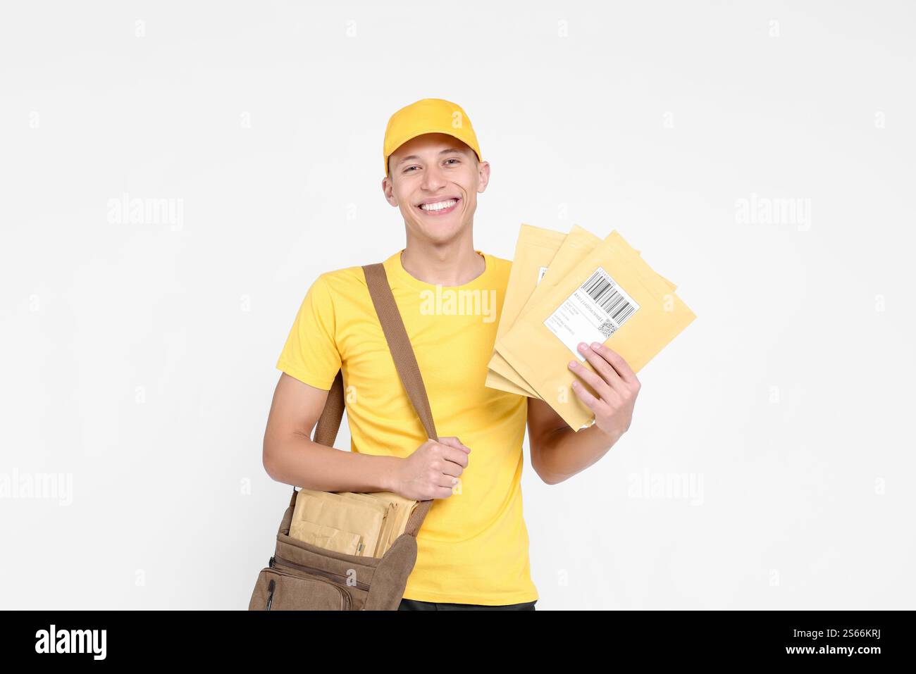 Happy postman with bag and envelopes on white background Stock Photo ...