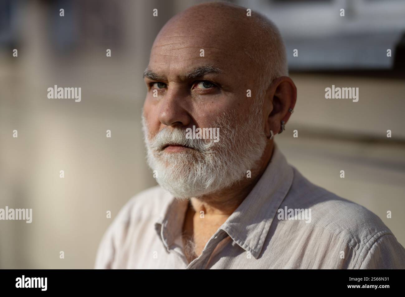 Middle-aged senior grandfather close up portrait. Grey hair white beard ...
