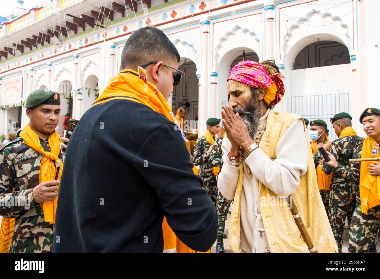 Janaki Mandir Sadhu gives a saffron scarf to the Nepal Army during the ...