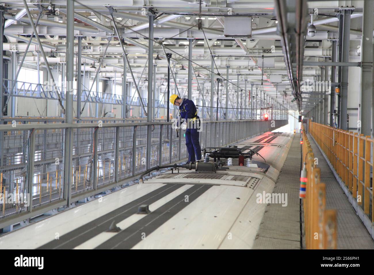 Technicians conduct maintenance for high-speed trains in Nanjing City ...