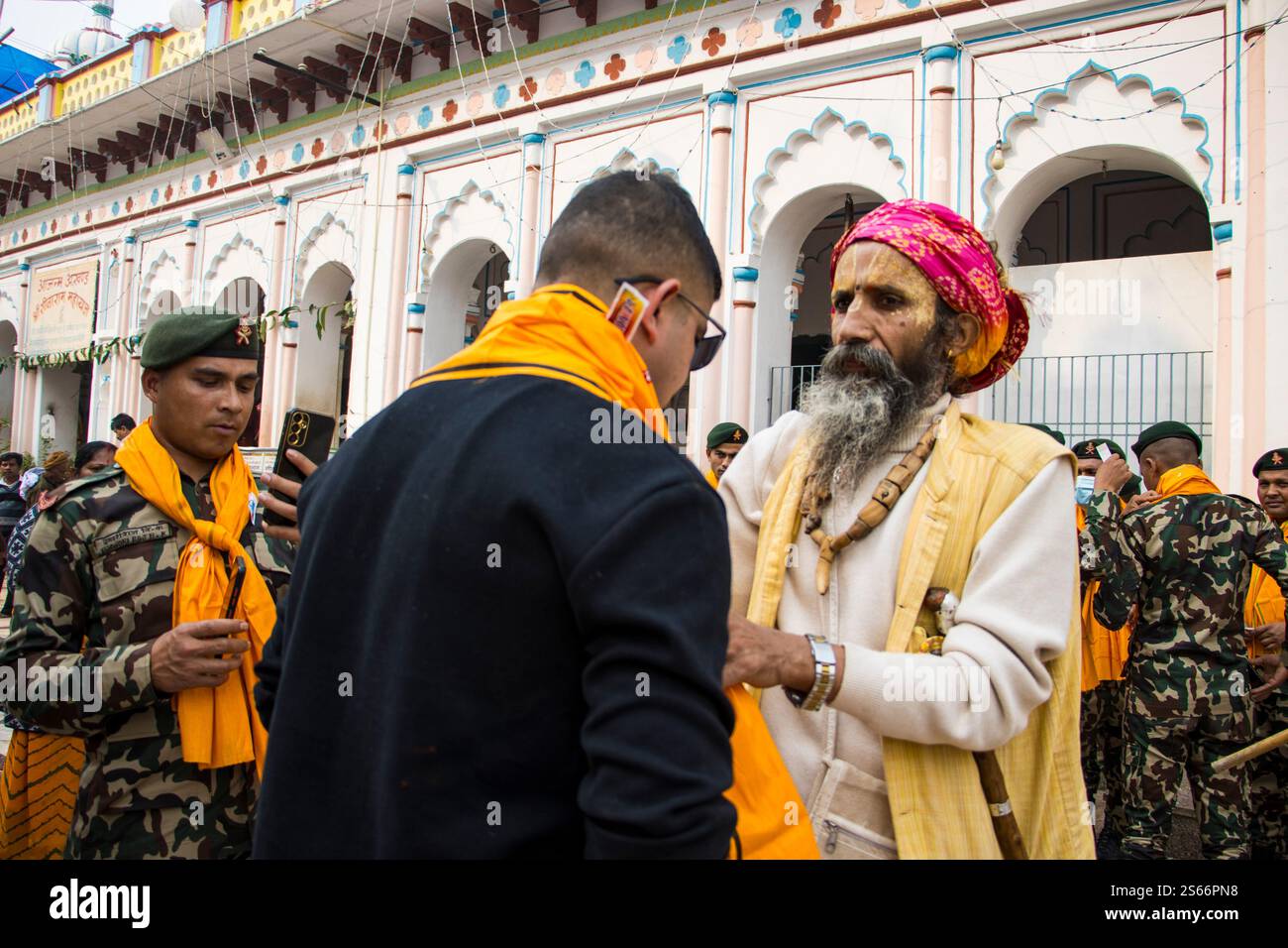 Janaki Mandir Sadhu gives a saffron scarf to the Nepal Army during the ...