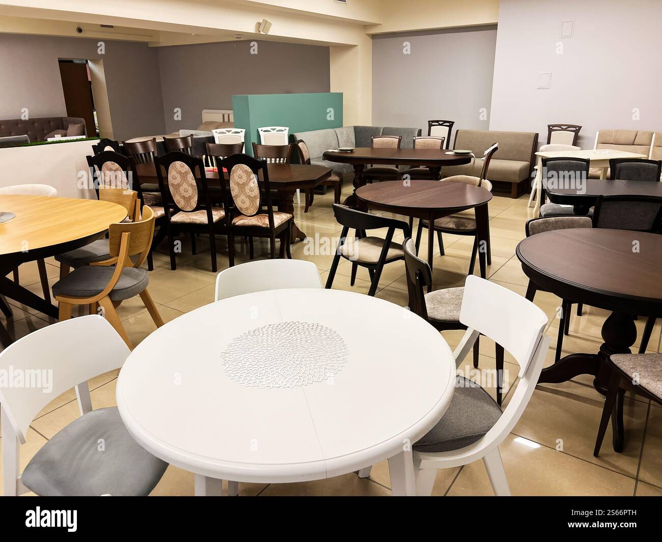 A well-organized furniture showroom featuring a wide selection of ...