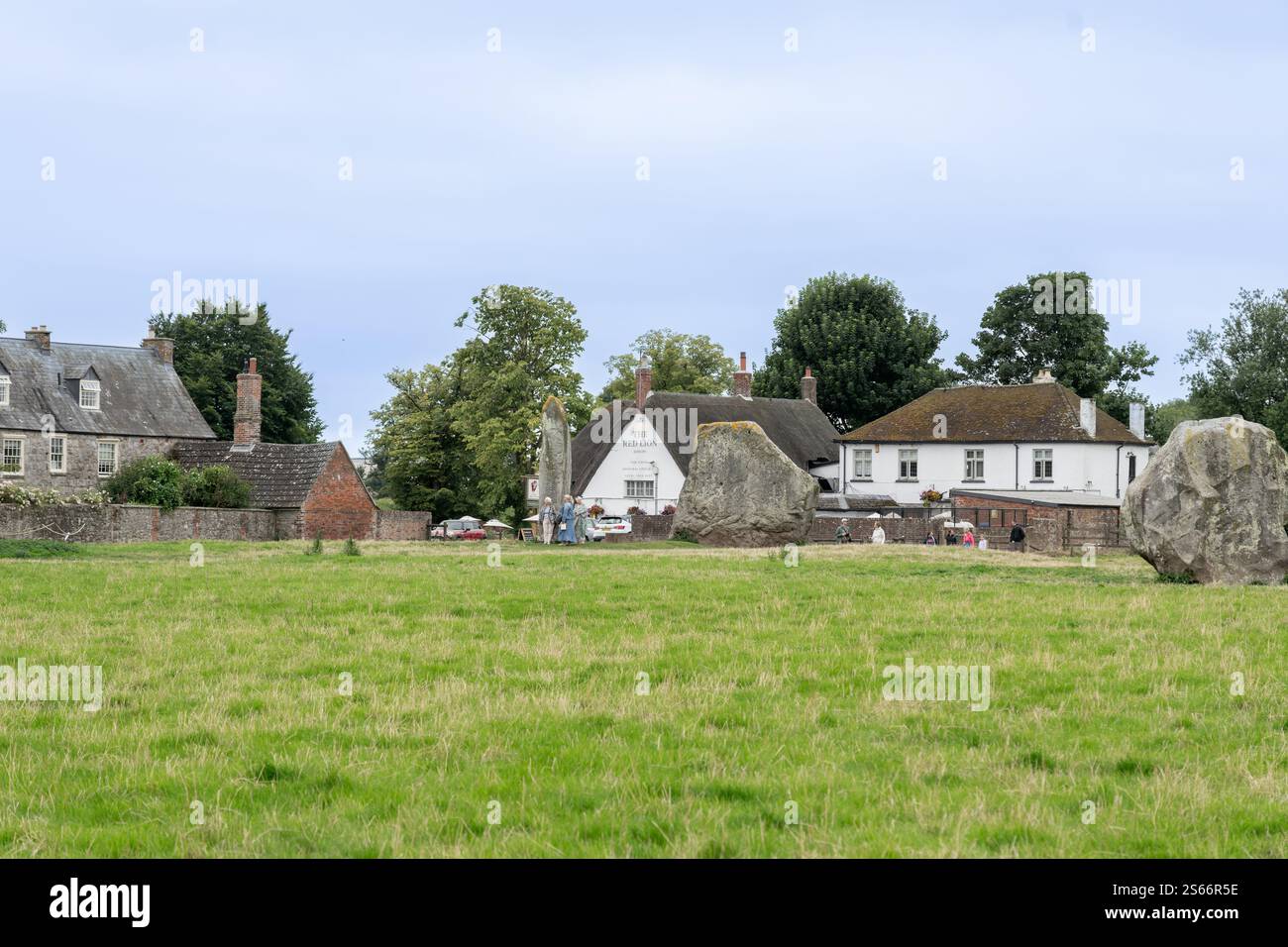 Avebury United kingdom - August 10 2024;Tourists and the Red Lion pub ...