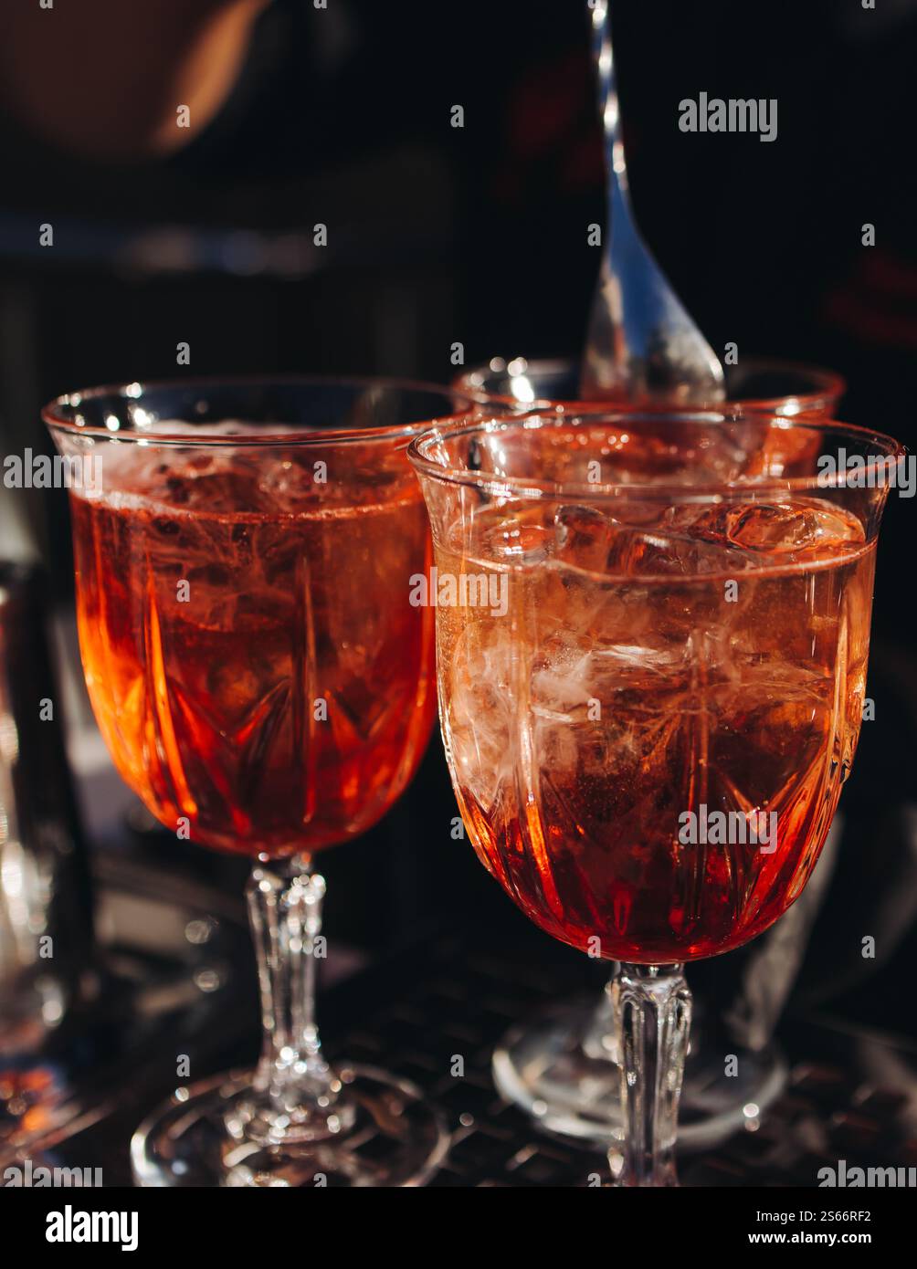 Pouring cocktail martini glass slow hi-res stock photography and images ...