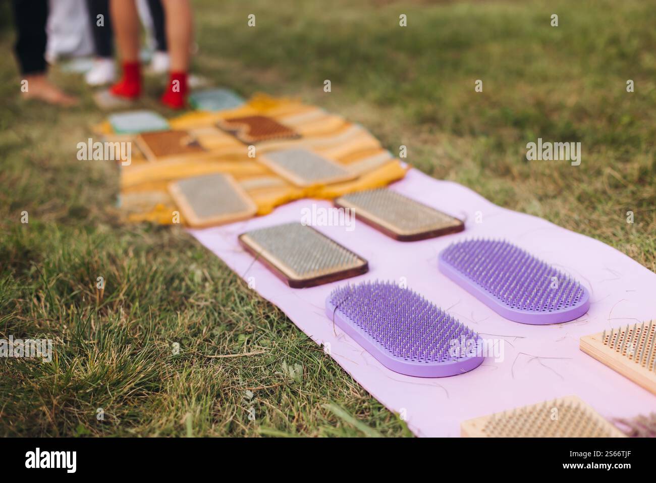 Standing on sadhu board, process of barefoot standing on nails therapy ...