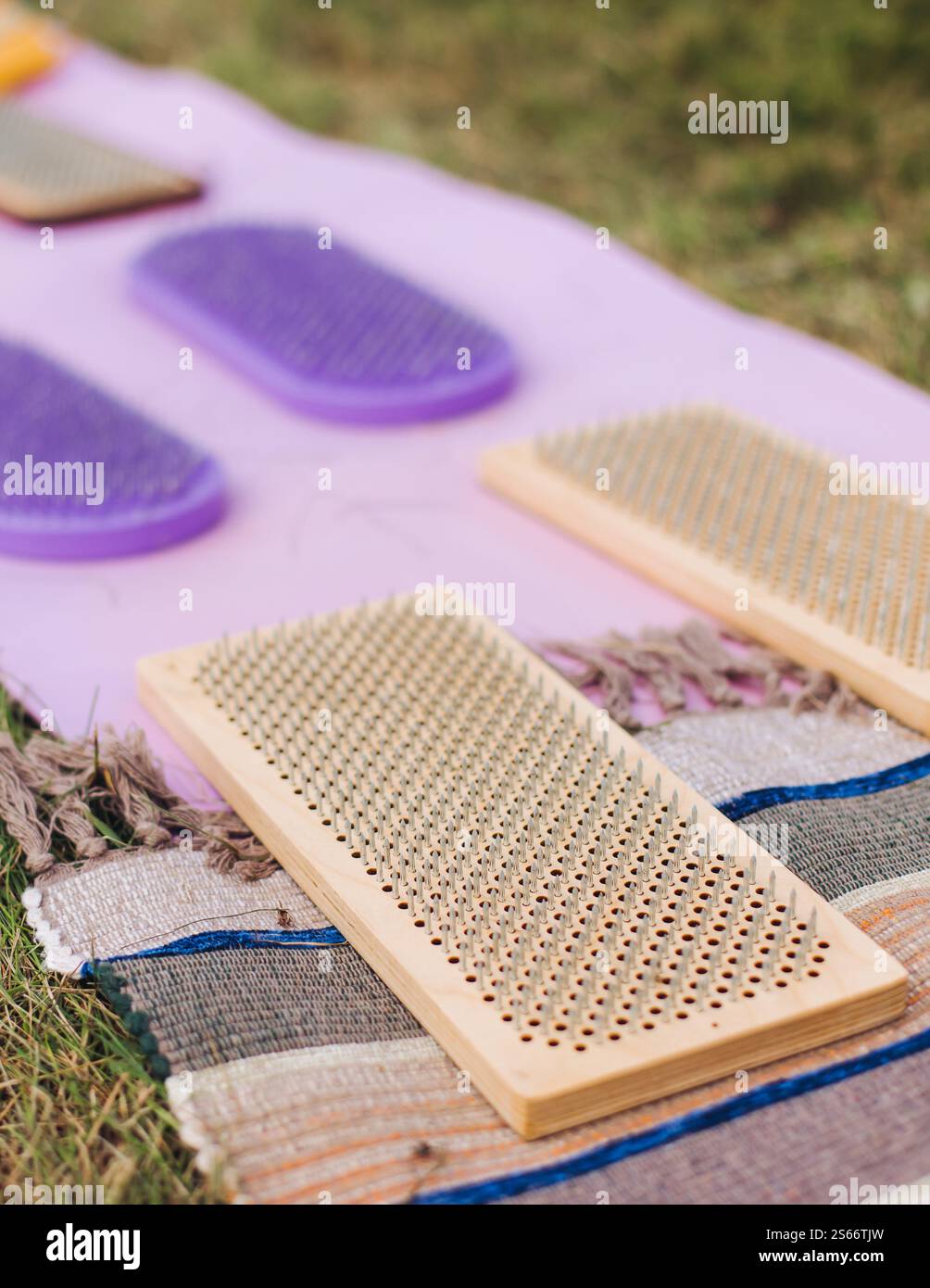 Standing on sadhu board, process of barefoot standing on nails therapy ...
