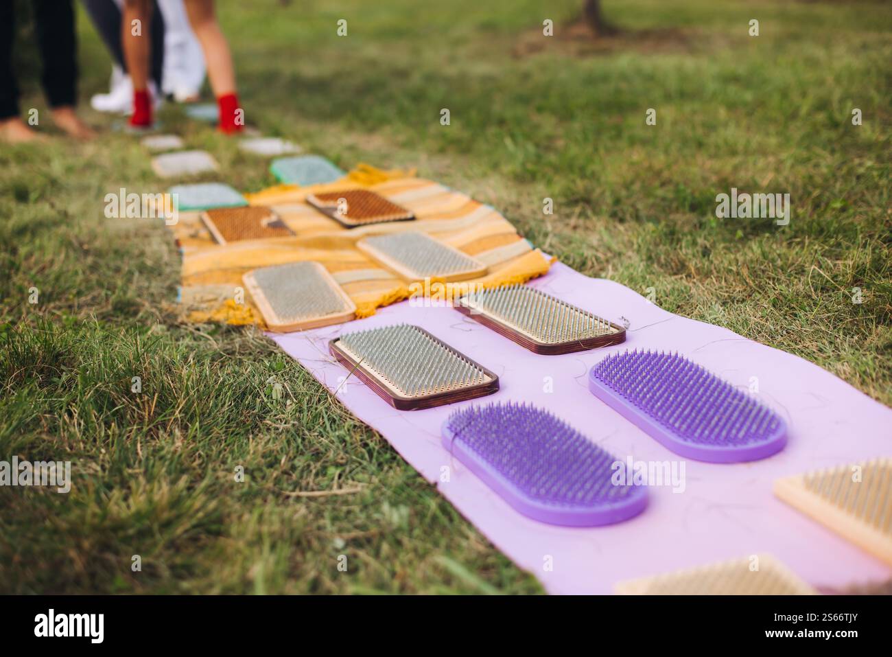 Standing on sadhu board, process of barefoot standing on nails therapy ...