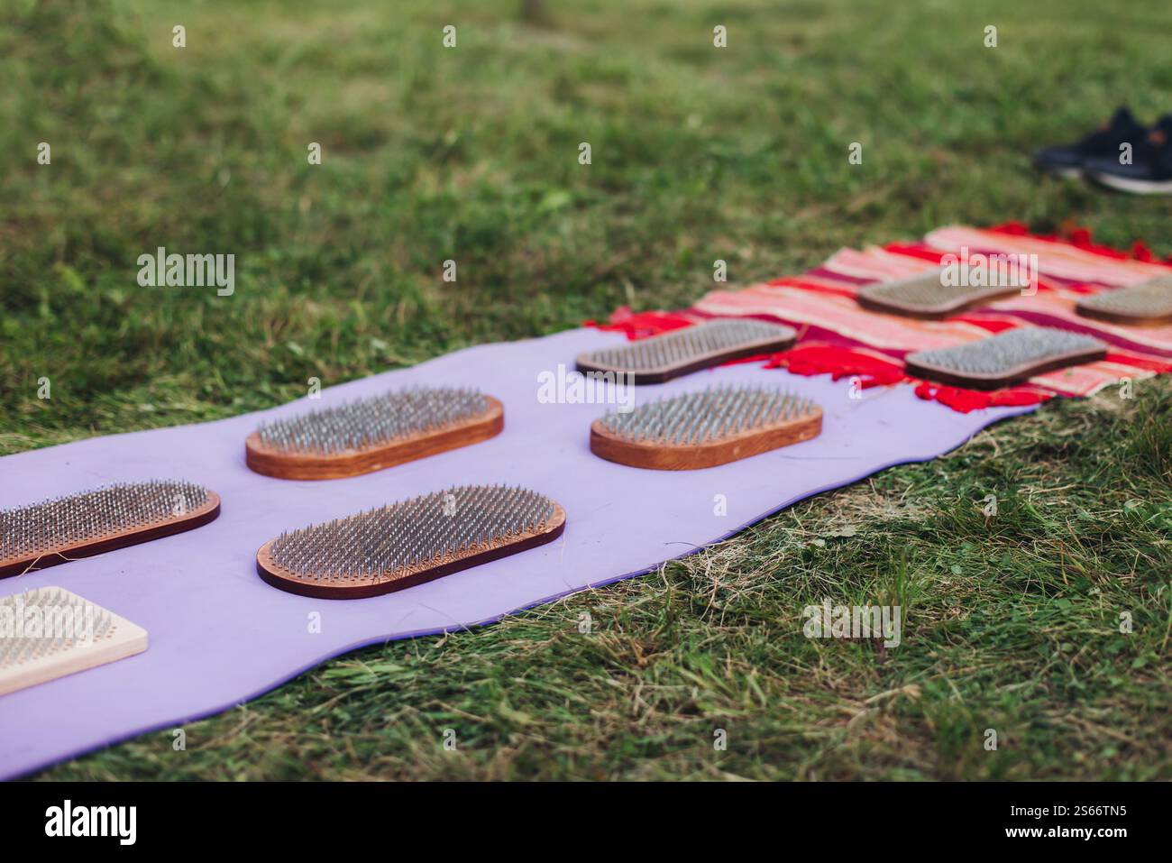 Standing on sadhu board, process of barefoot standing on nails therapy ...