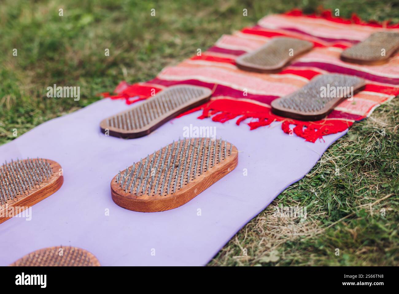 Standing on sadhu board, process of barefoot standing on nails therapy ...