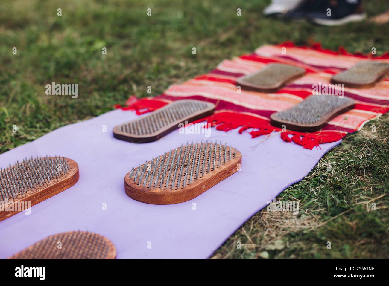 Standing on sadhu board, process of barefoot standing on nails therapy ...