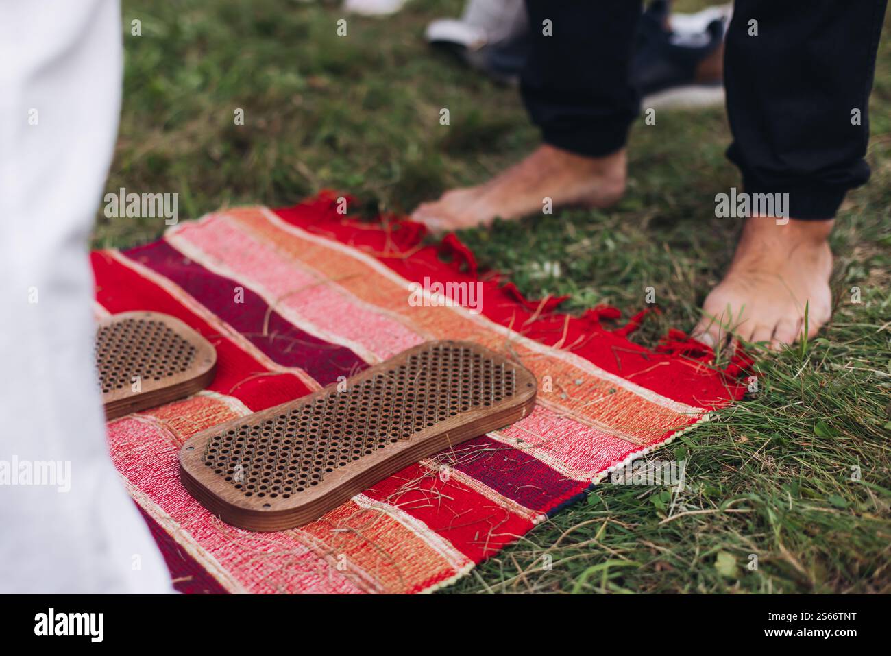 Standing on sadhu board, process of barefoot standing on nails therapy ...