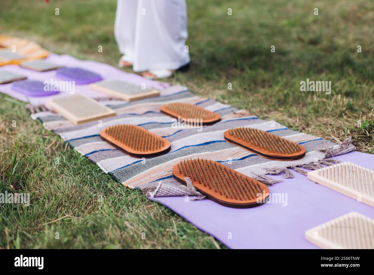 Standing on sadhu board, process of barefoot standing on nails therapy ...
