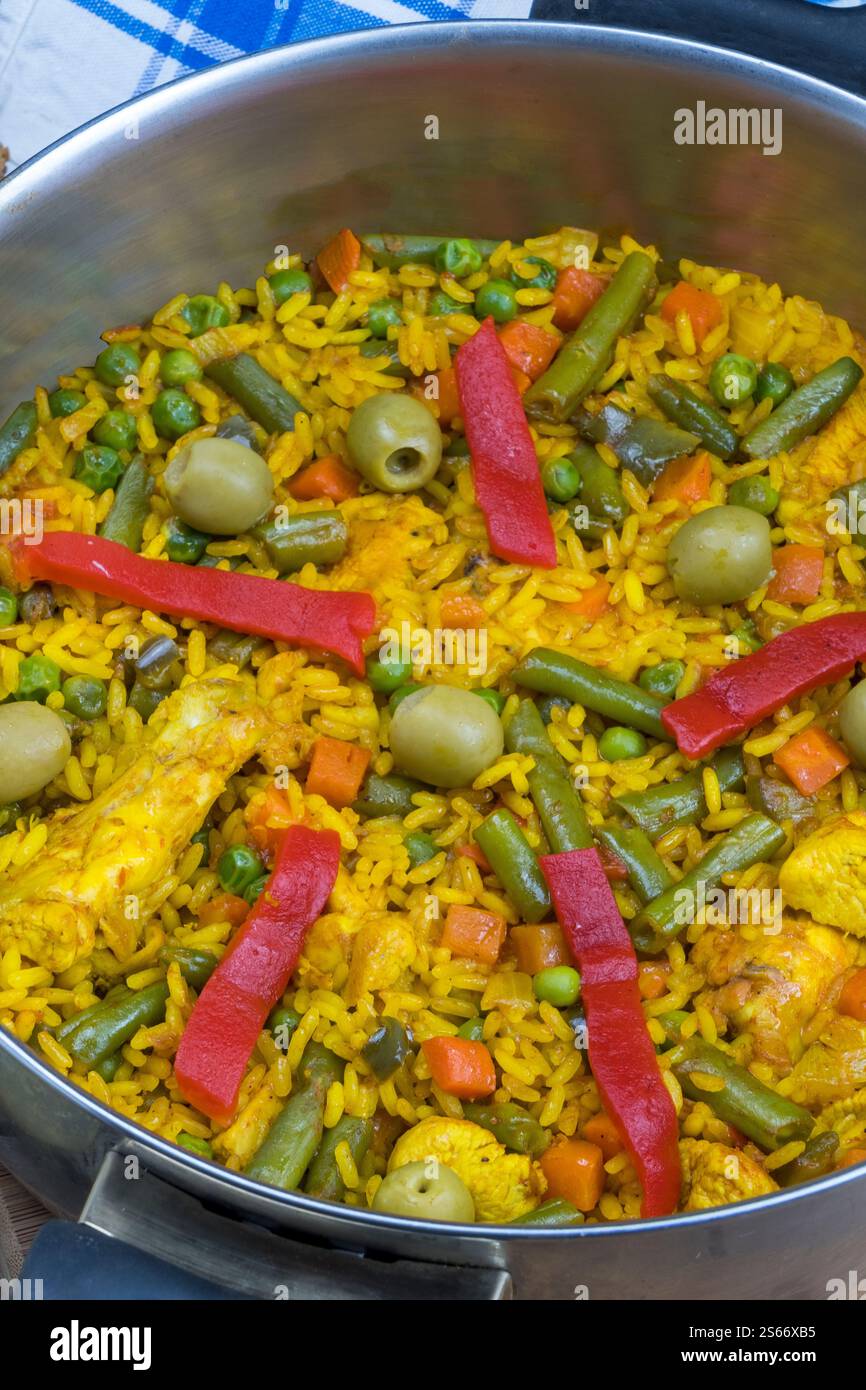 Yellow rice with chicken, Canarian style Stock Photo - Alamy