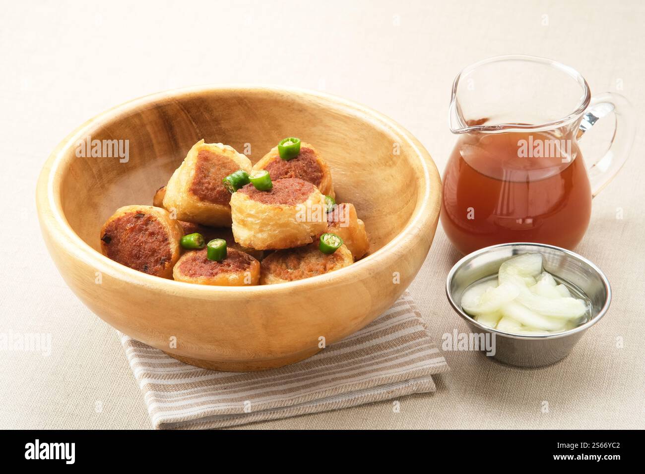 Gohyong or Ngo Hiang, made from minced chicken with flour, served with ...