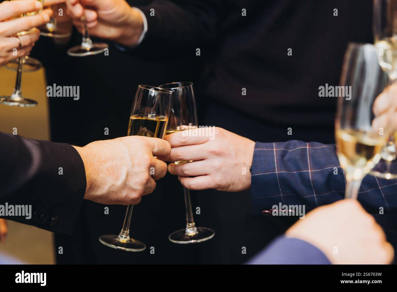 Group of businessmen celebrate, closing successful concluded deal ...