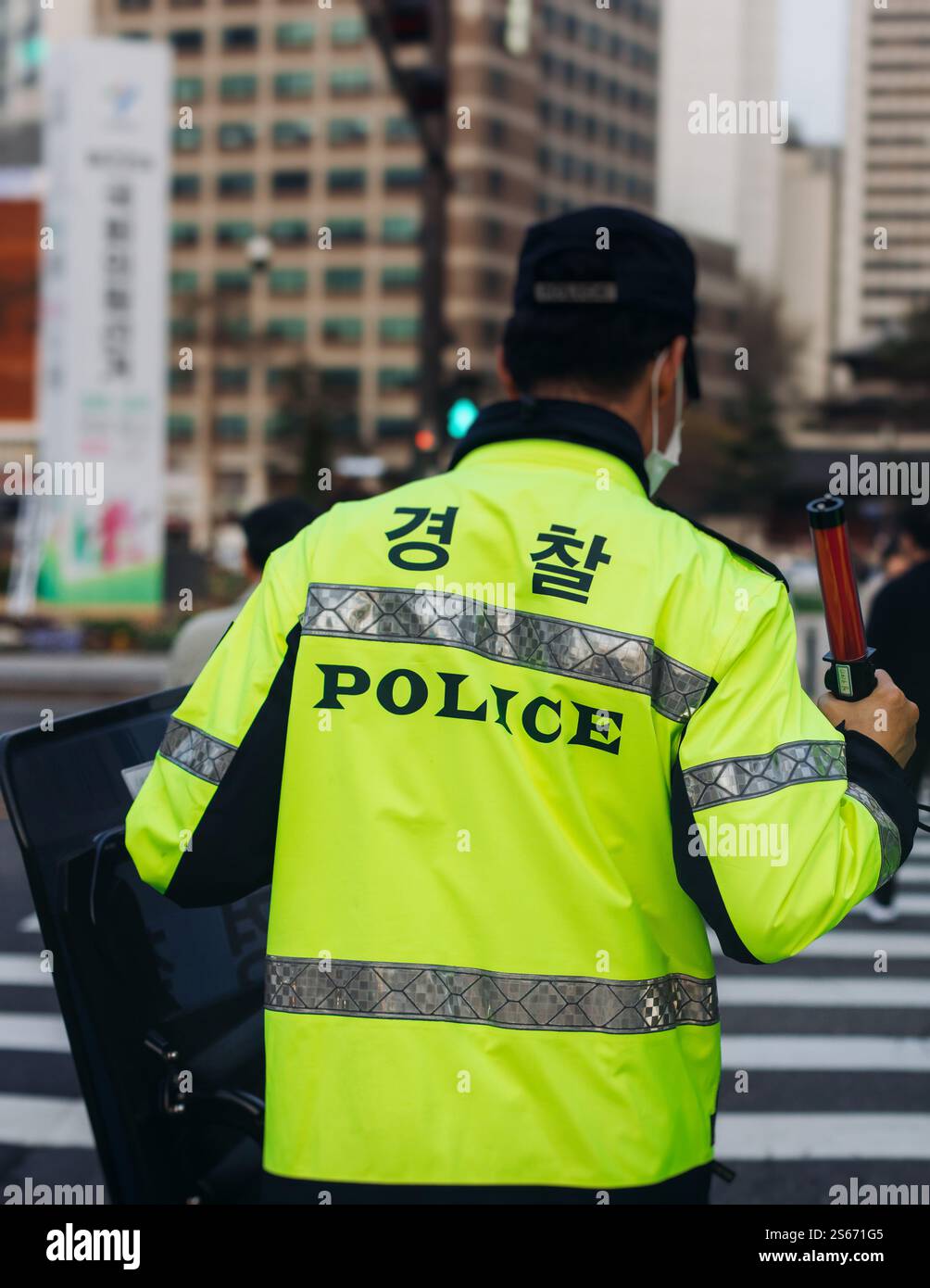 Korean police squad formation in protective uniform with "Police" logo ...