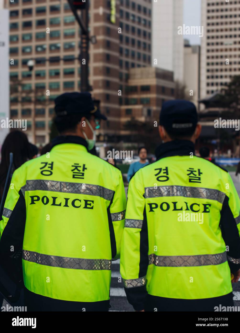 Korean police squad formation in protective uniform with "Police" logo ...