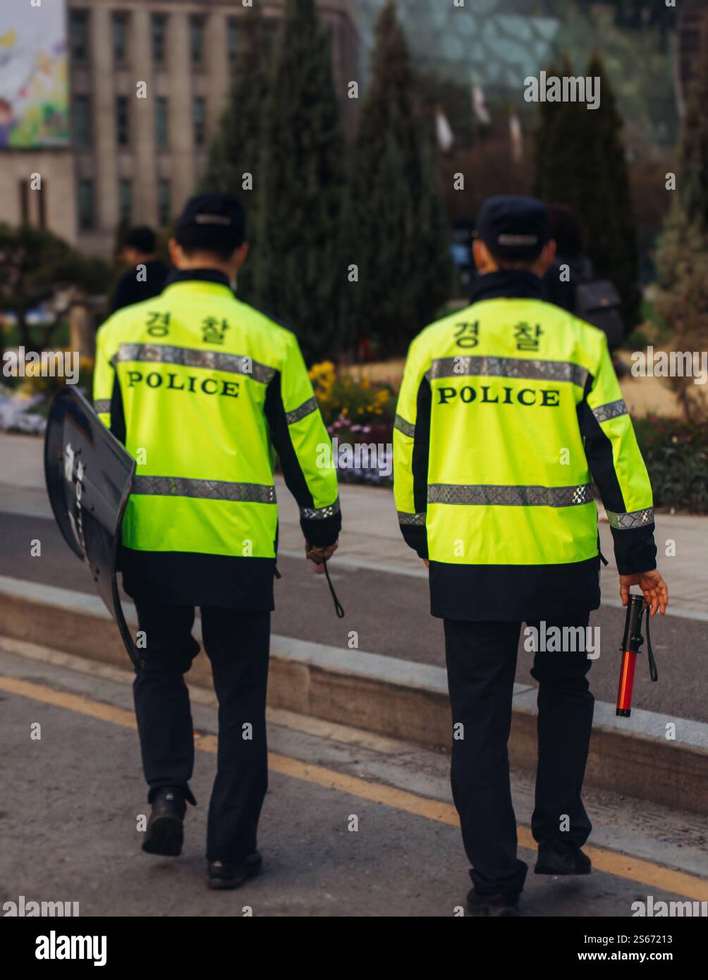 Korean police squad formation in protective uniform with "Police" logo ...