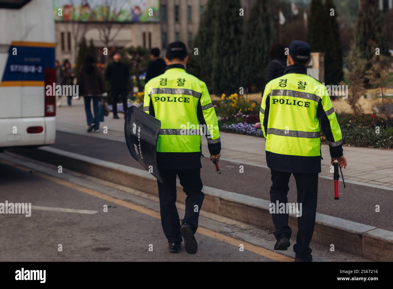 Korean police squad formation in protective uniform with "Police" logo ...