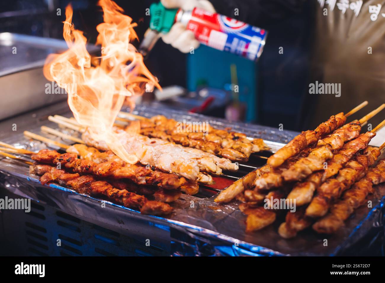 Korean barbecue, Ddakkochi, grilled chicken and pork skewers, variety ...