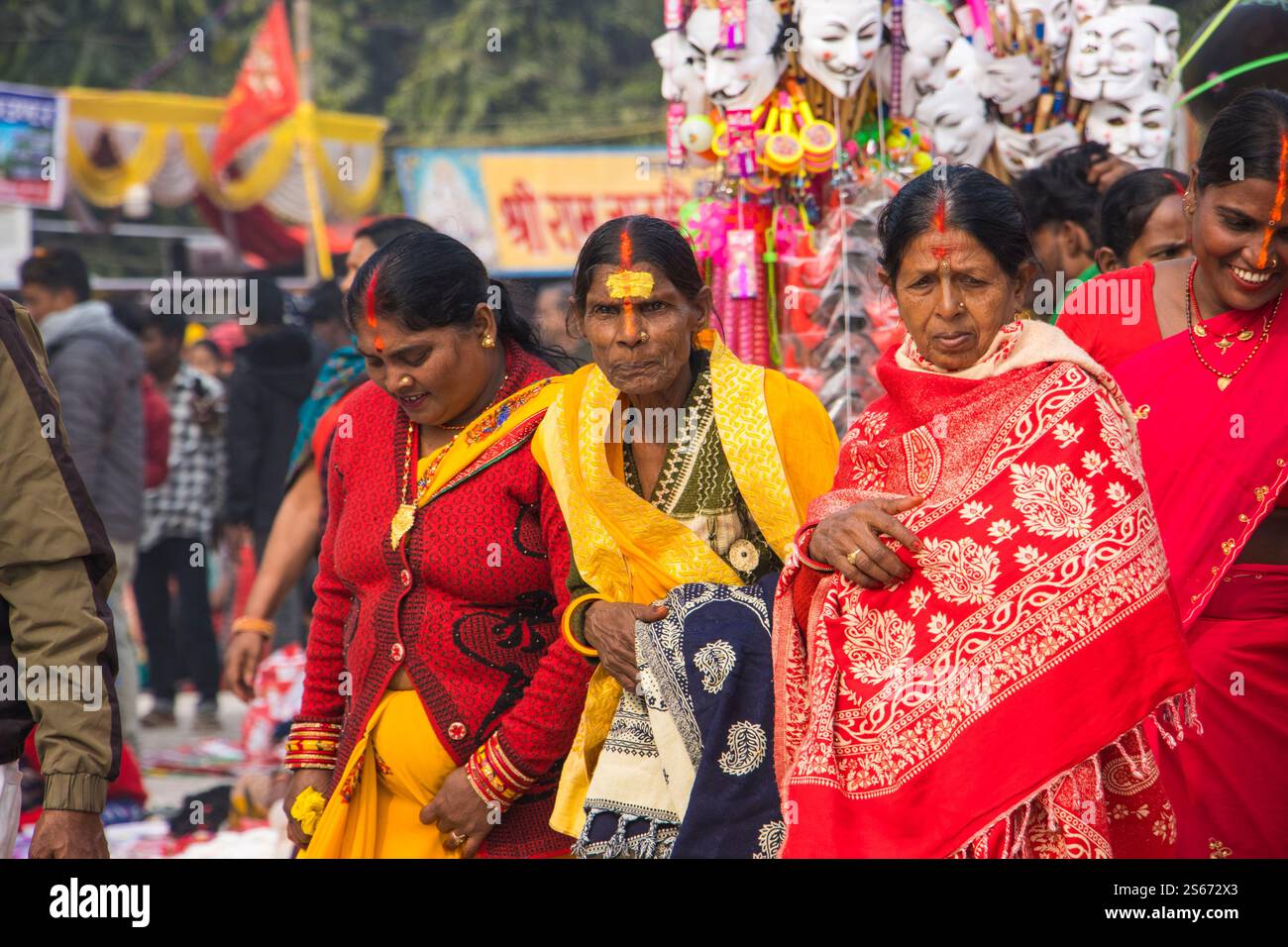 Pilgrims don a long sindur tika tracing from the tip of the nose to the ...