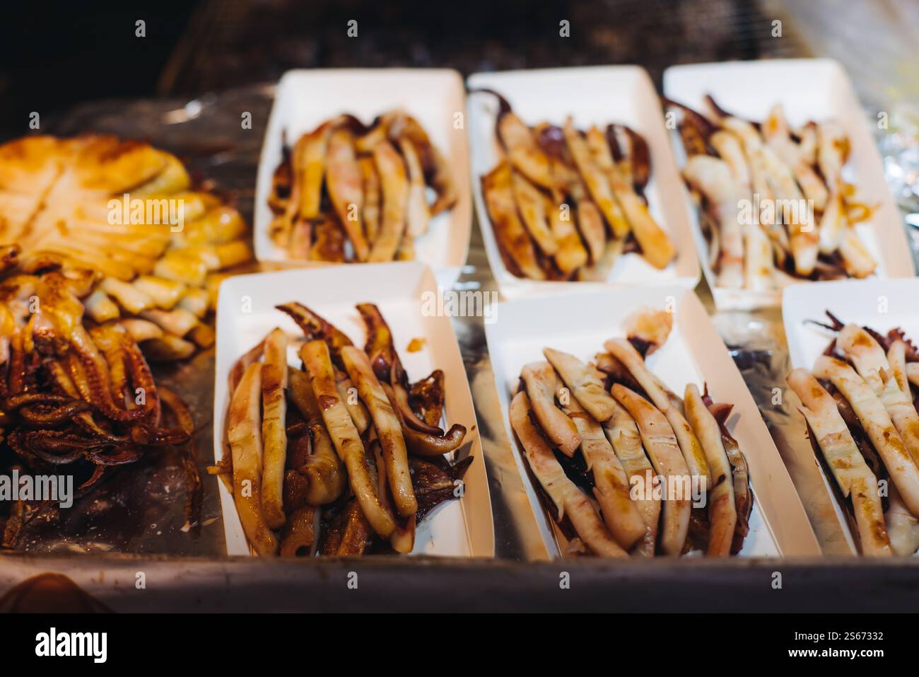 Korean Spicy Grilled Squid, Ojingeo tonggui, grilled octopus tentacles ...