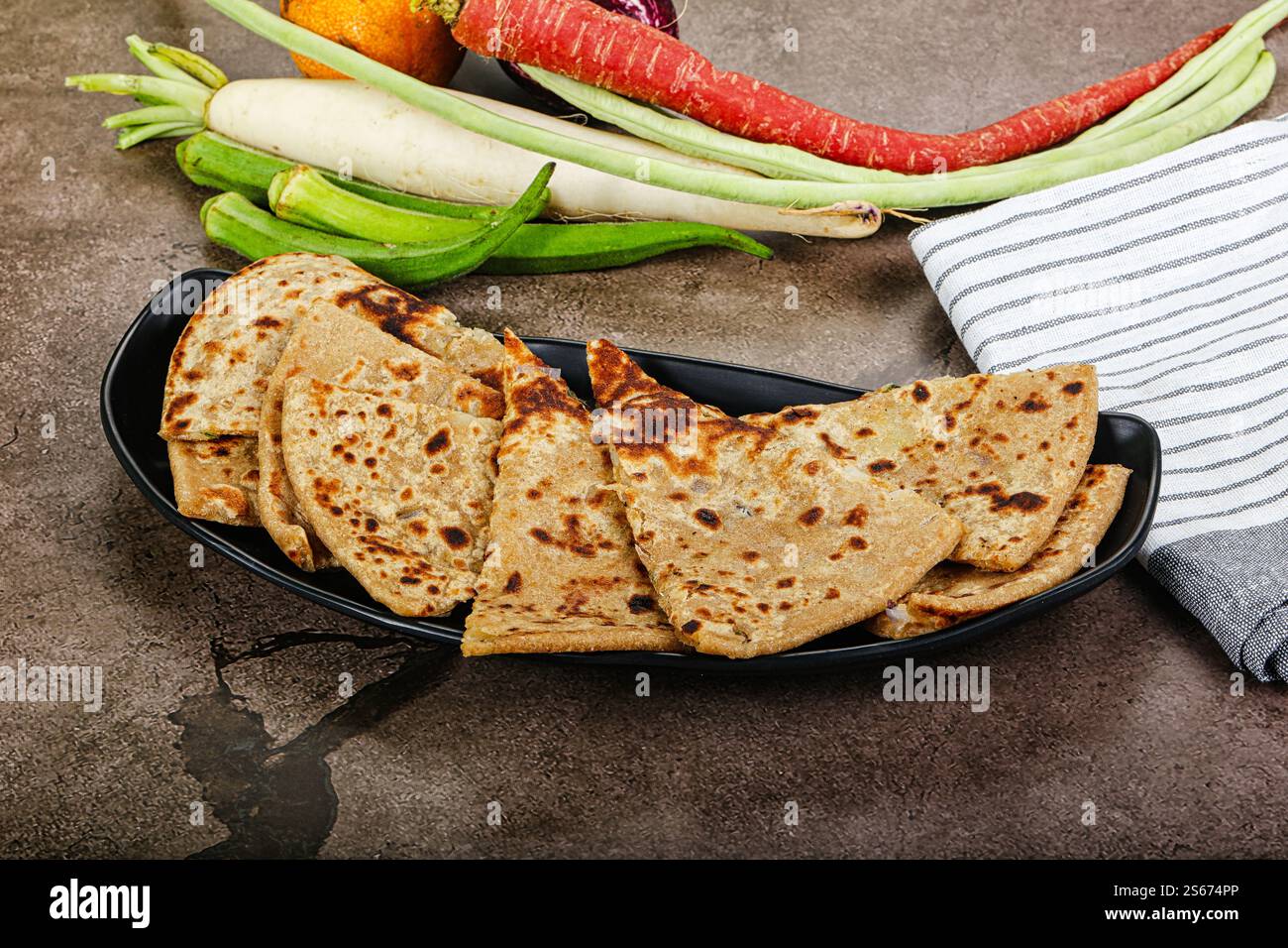 Indian vegetarian Aloo Paratha - bread with potato Stock Photo - Alamy