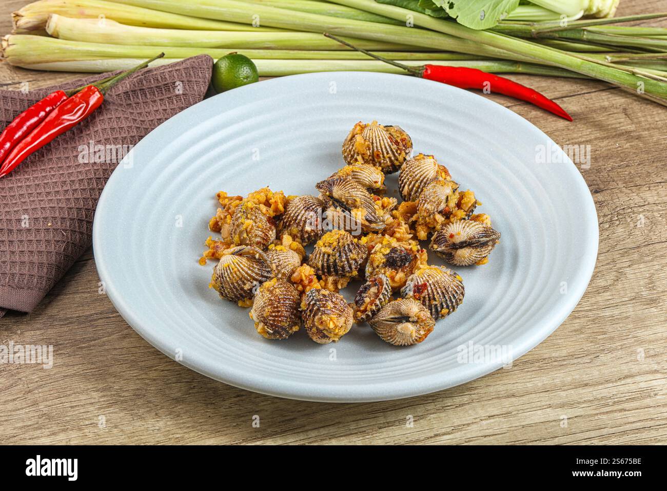 Blood Cockle Fried With Garlic and spices Stock Photo - Alamy
