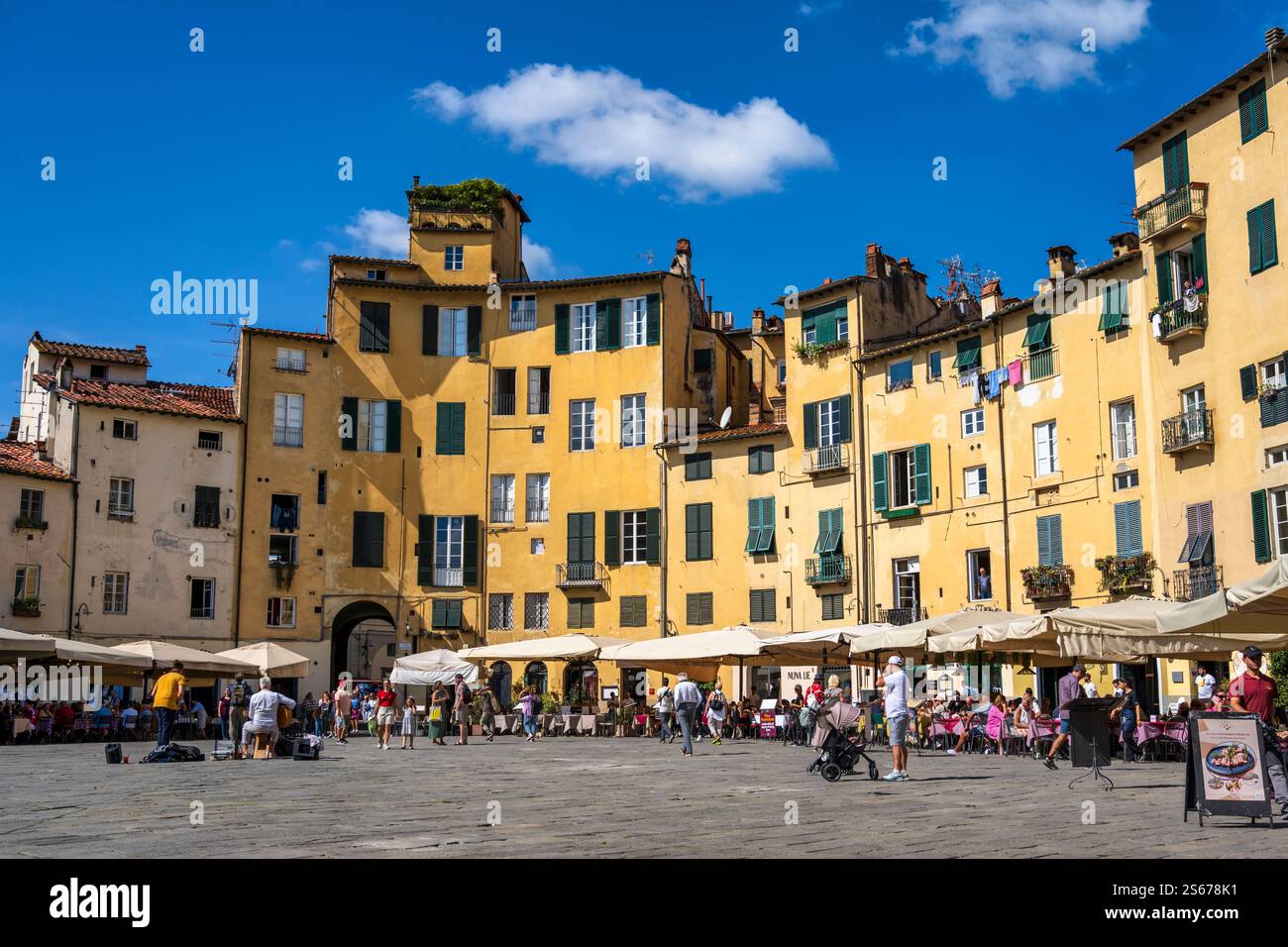 Colourful buildings on Piazza dell'Anfiteatro built on the remains of ...