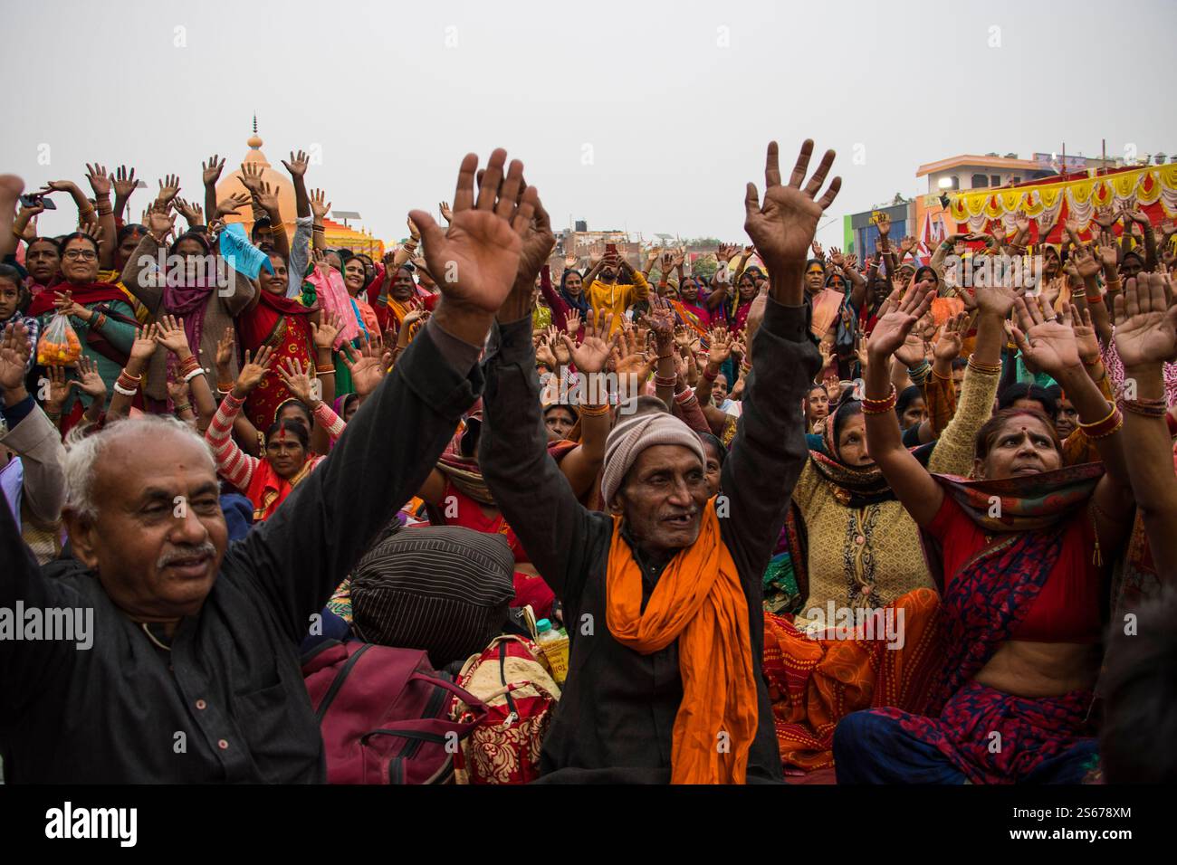 Pilgrims raise both hands chanting "Jai Siya Ram" in between musical ...