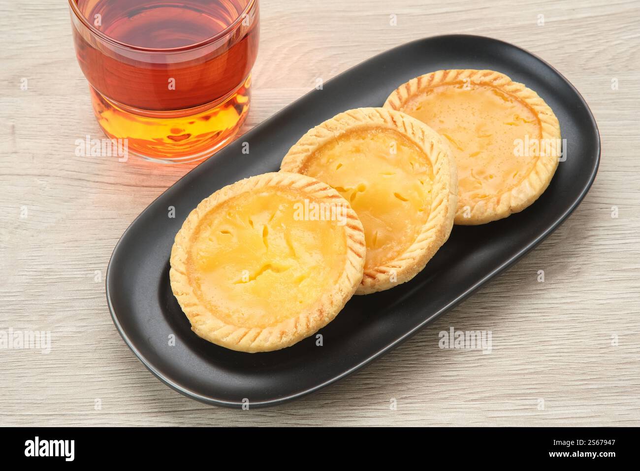 Pie Susu Bali with creamy milk custard topping. Indonesian food Stock ...