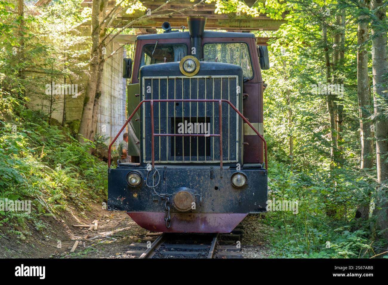 Carpathian tram cabin. Steam locomotive on a narrow-gauge railway. Old ...