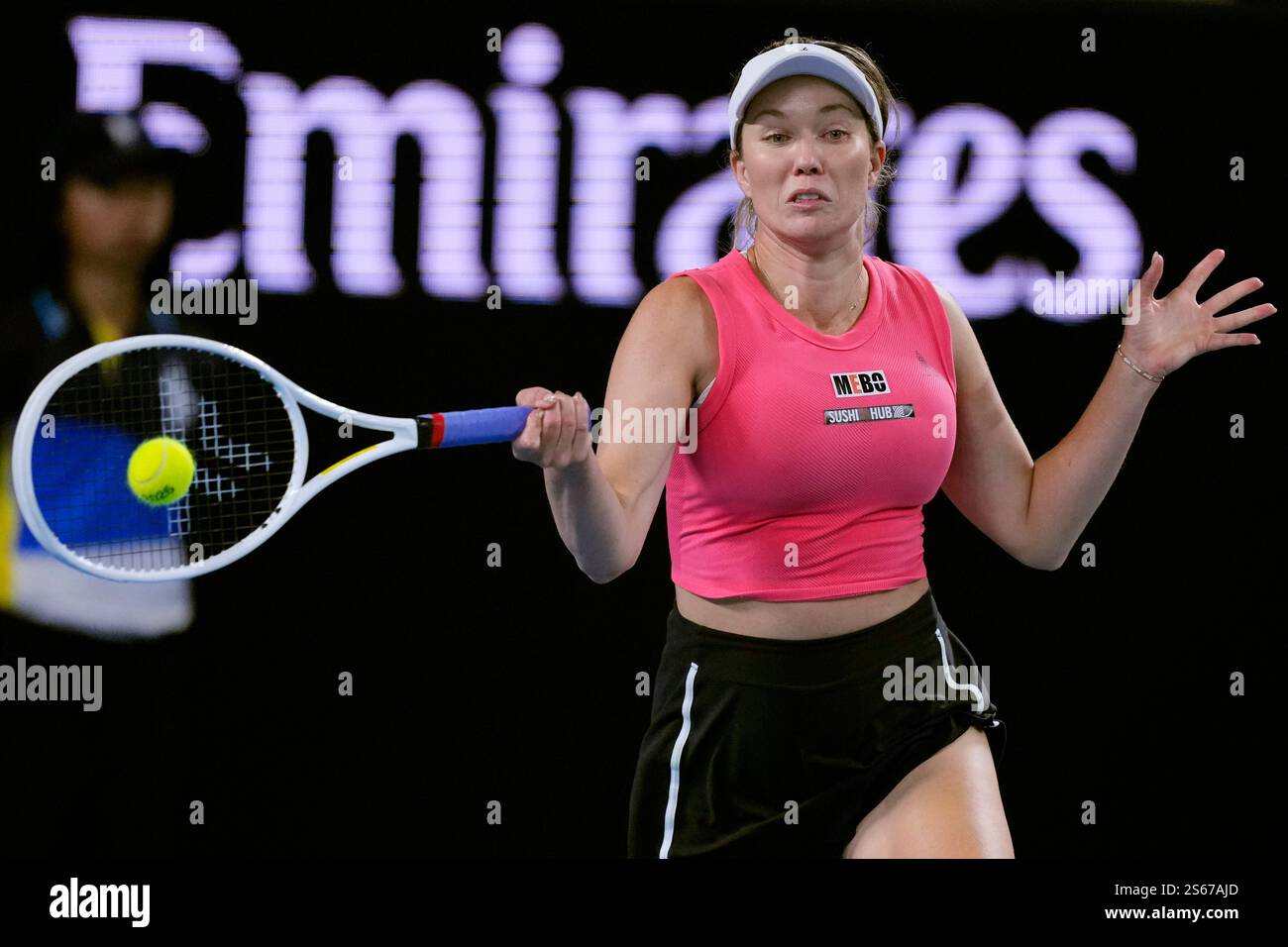 Danielle Collins of the U.S. plays a forehand return to Destanee Aiava ...