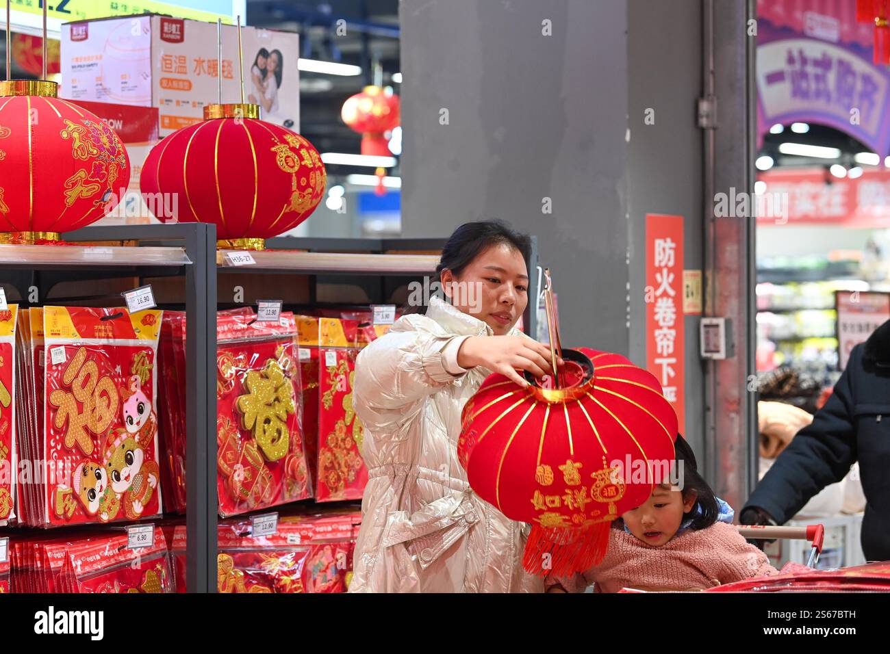 People select Spring Festival decorations in a market in Chongqing ...