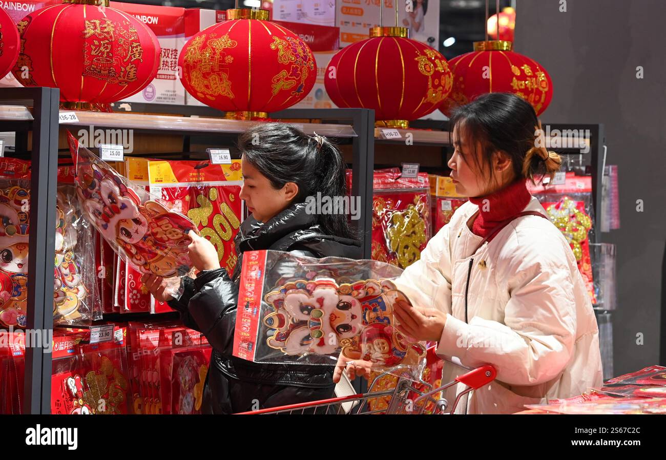 People select Spring Festival decorations in a market in Chongqing ...