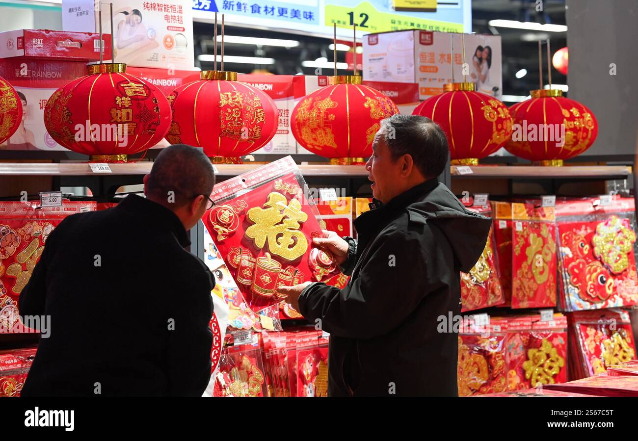 People select Spring Festival decorations in a market in Chongqing ...