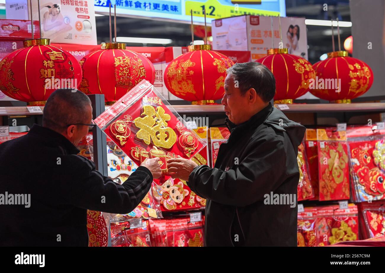 People select Spring Festival decorations in a market in Chongqing ...