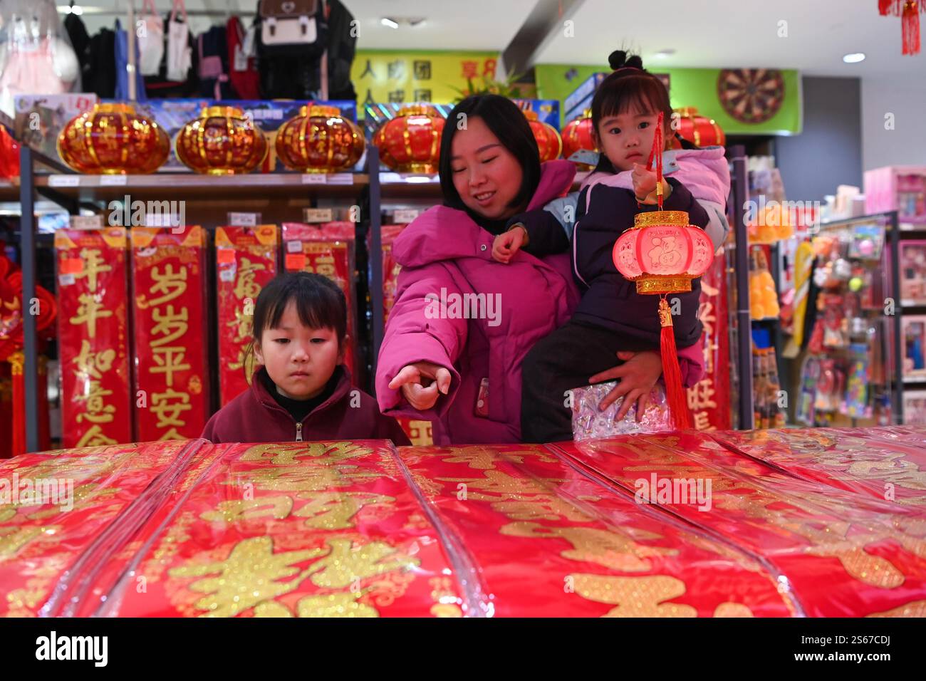 People select Spring Festival decorations in a market in Chongqing ...