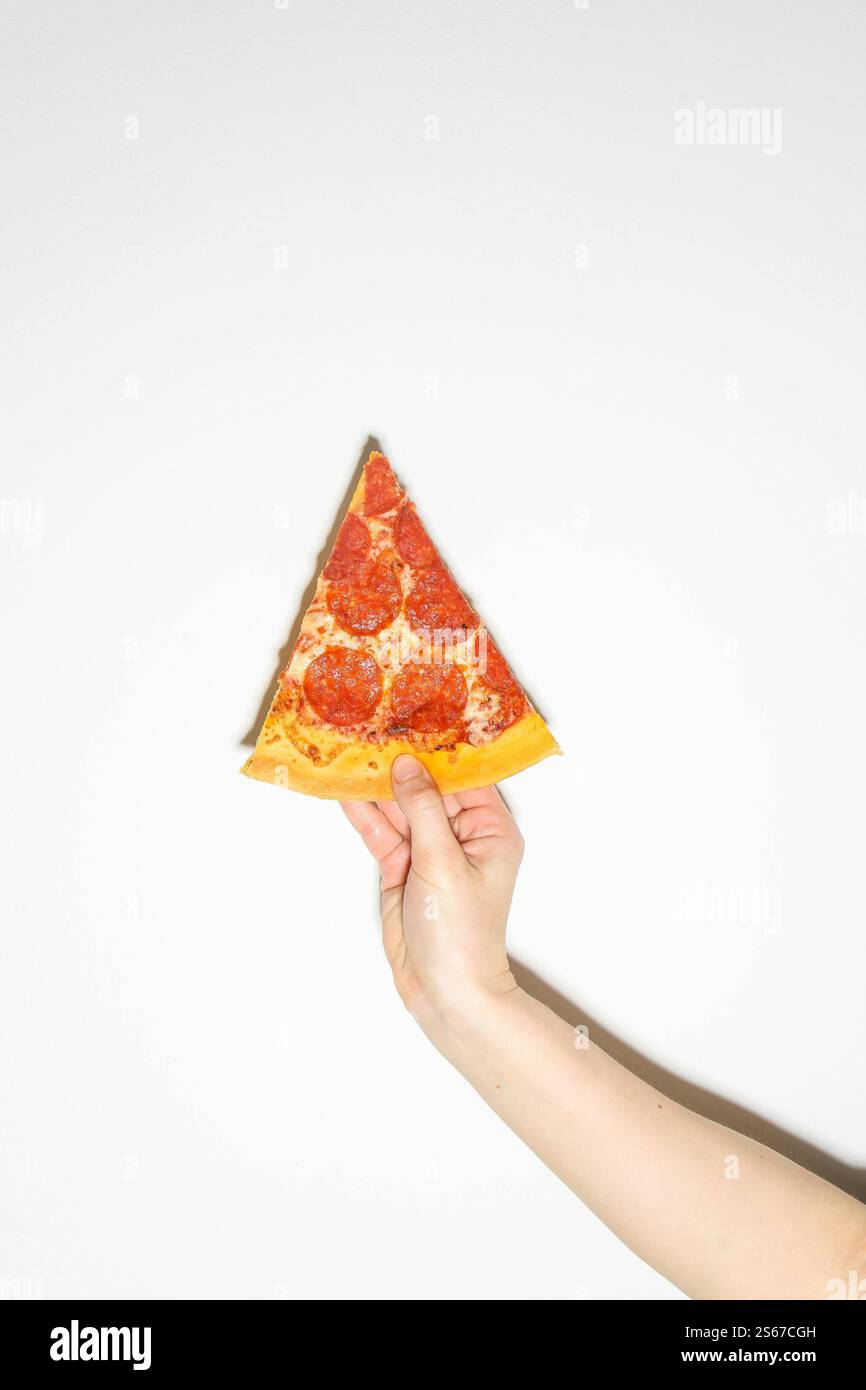 Female cook holding pizza hi-res stock photography and images - Alamy