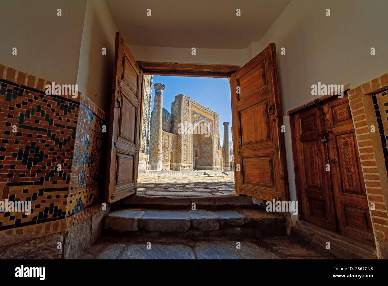 The entrance to Registan Square with a view of the Sher-Dor Madrasah ...