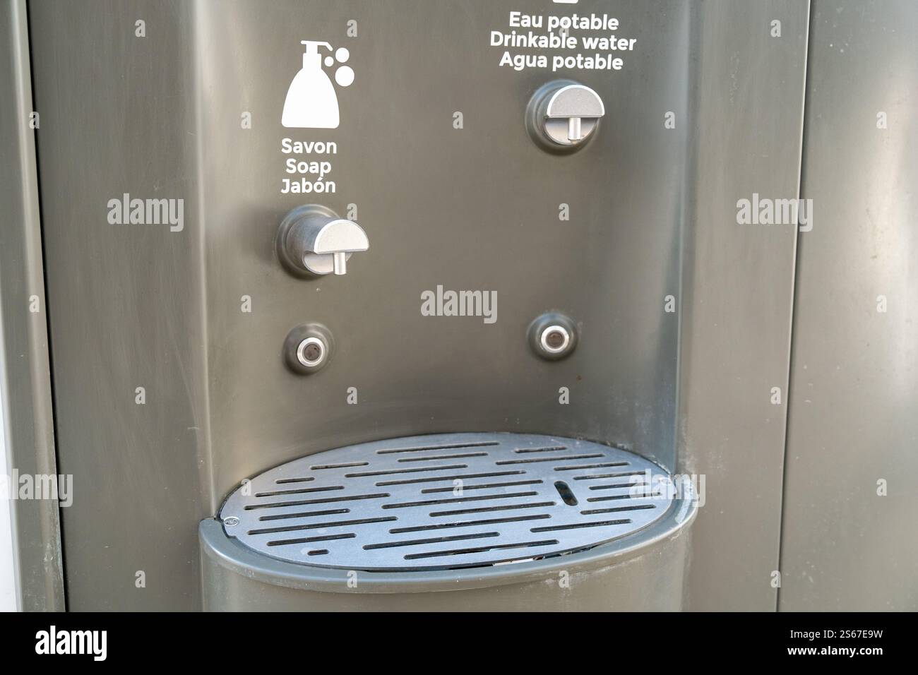 Hand washing station with soap and drinking water in public area Stock ...