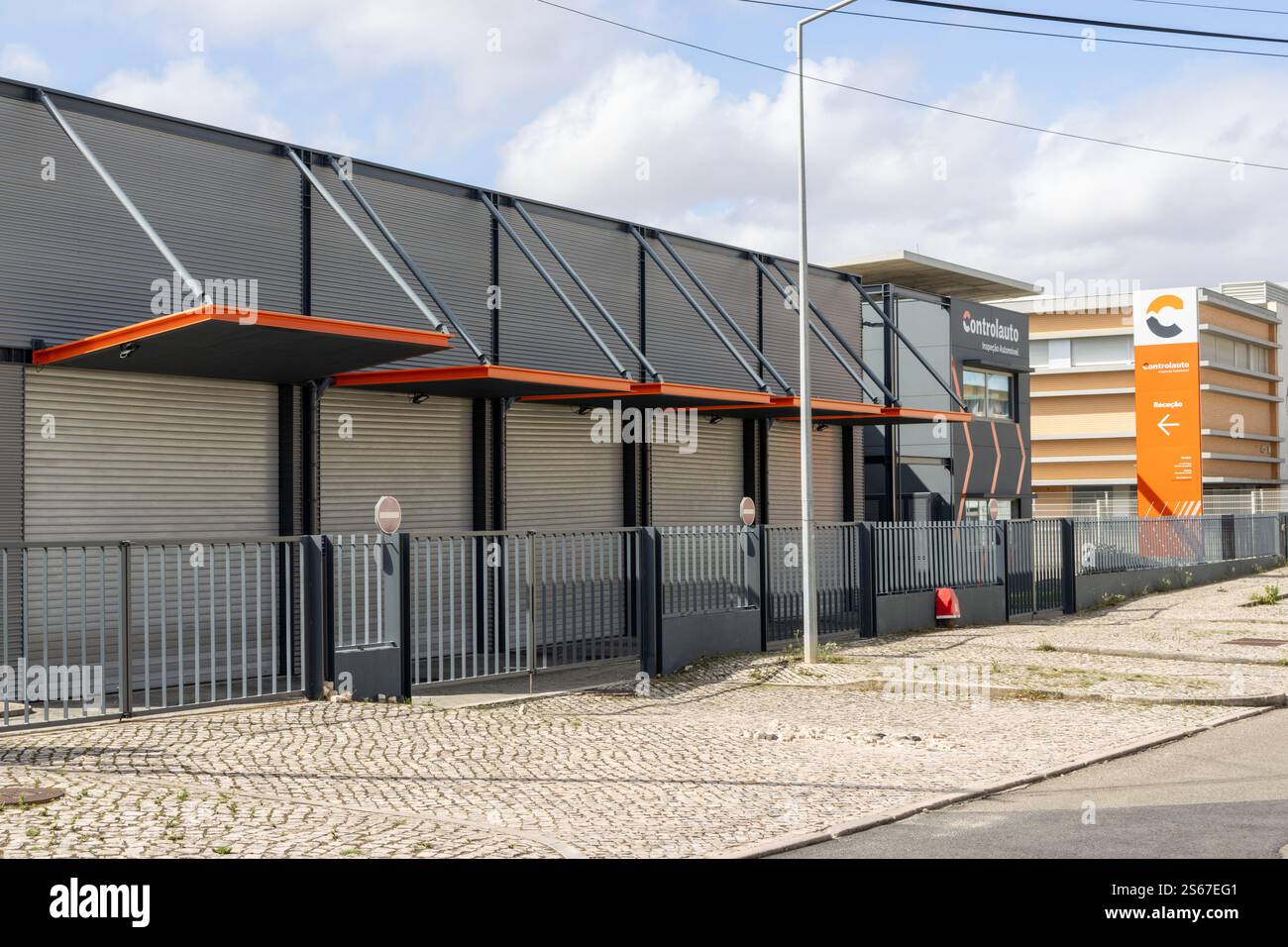 Controlauto, a vehicle periodic inspection center, stands with closed ...