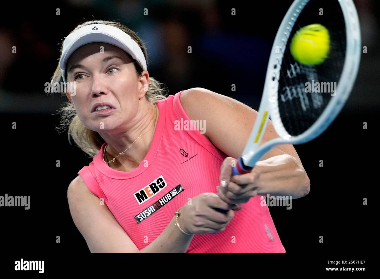 Danielle Collins of the U.S. plays a backhand return to Destanee Aiava ...
