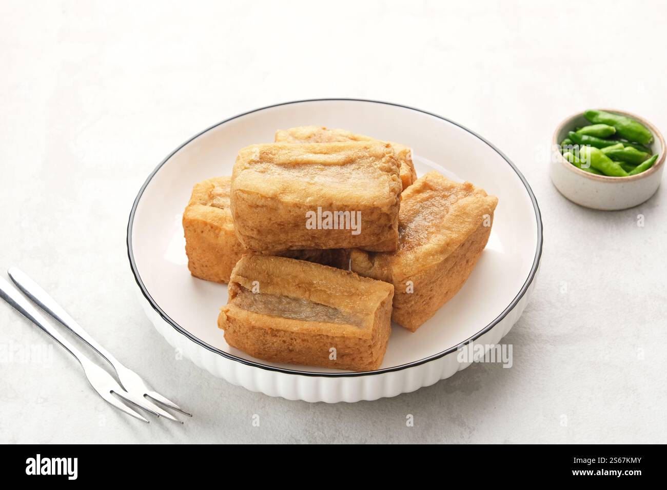 Tahu Bakso, made from tofu filled with meatball dough, served with ...
