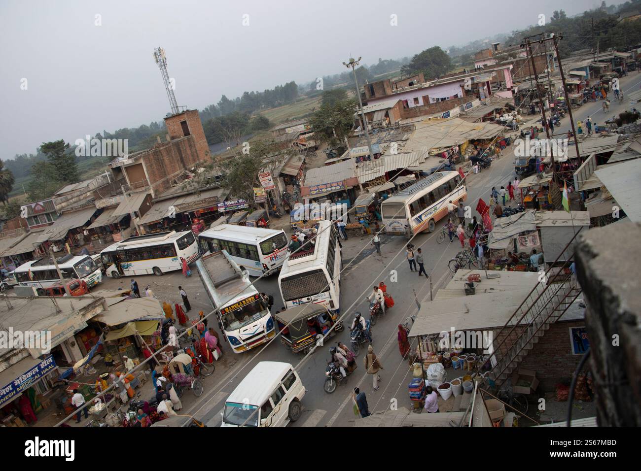 Buses in Bhitamode, the Nepal – India Border, ferry thousands of Indian ...